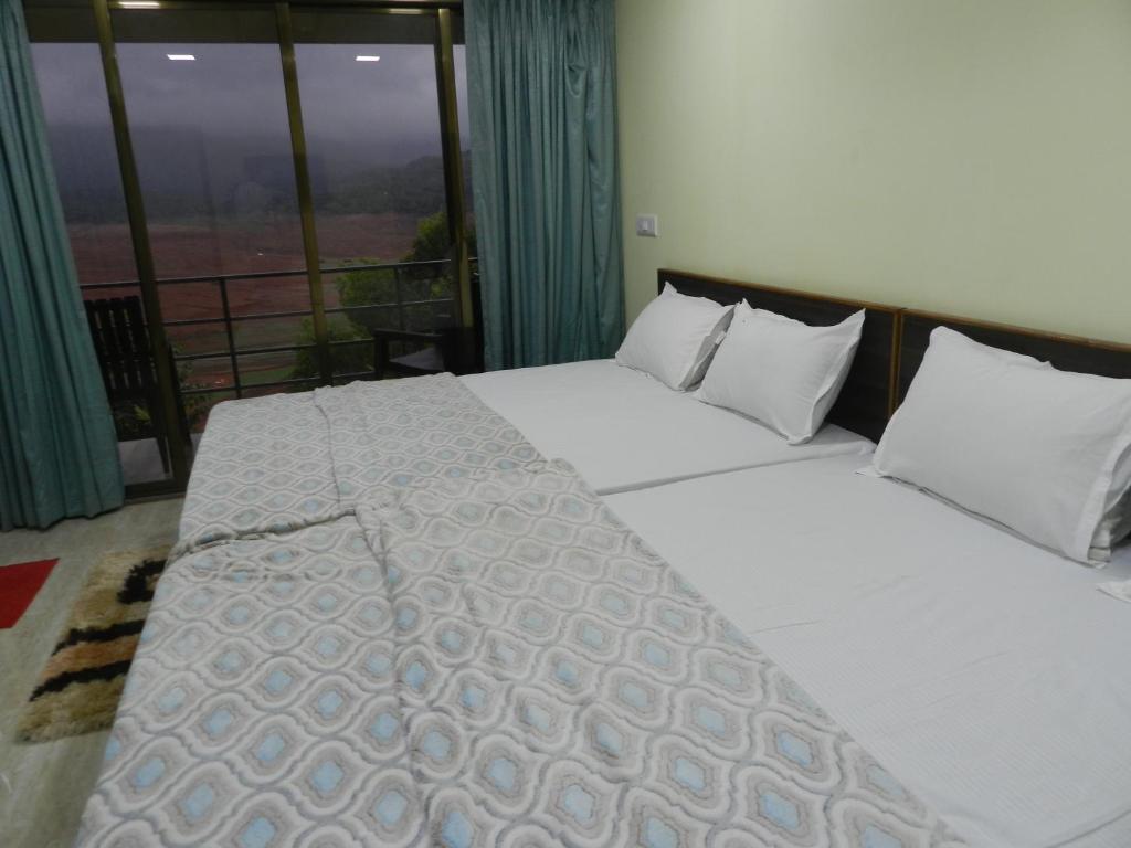 Book The Nihal Resort Hotel in Mahabaleshwar Starting From AED 184